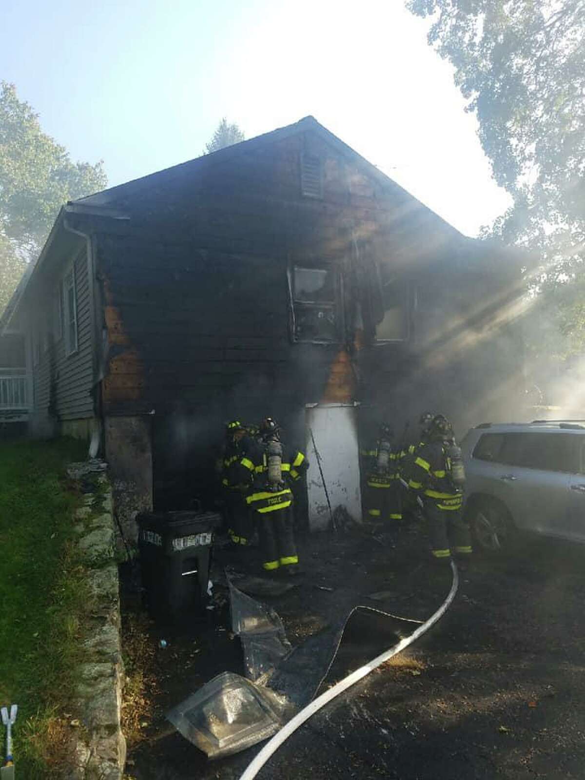Day after blaze, Norwalk house catches fire again