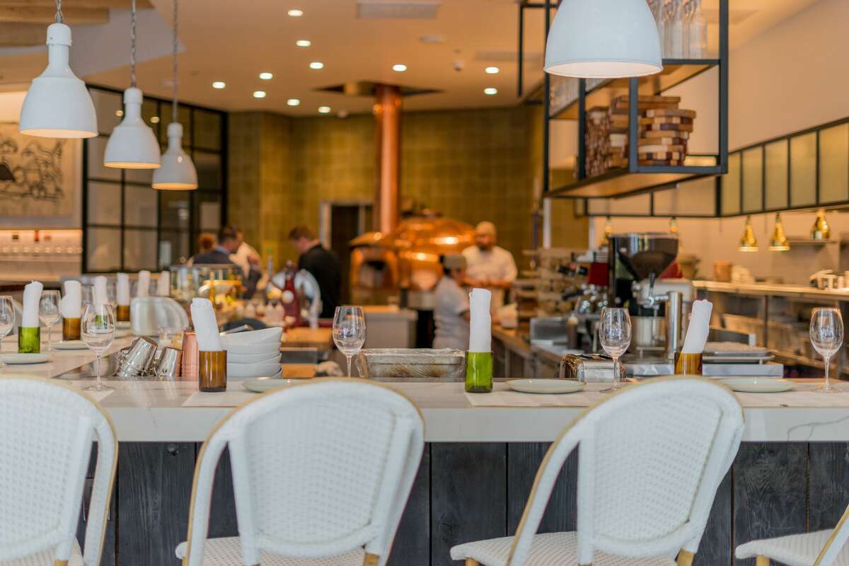 Sixty Vines in Rice Village, offering seasonal fare and wines on tap ...