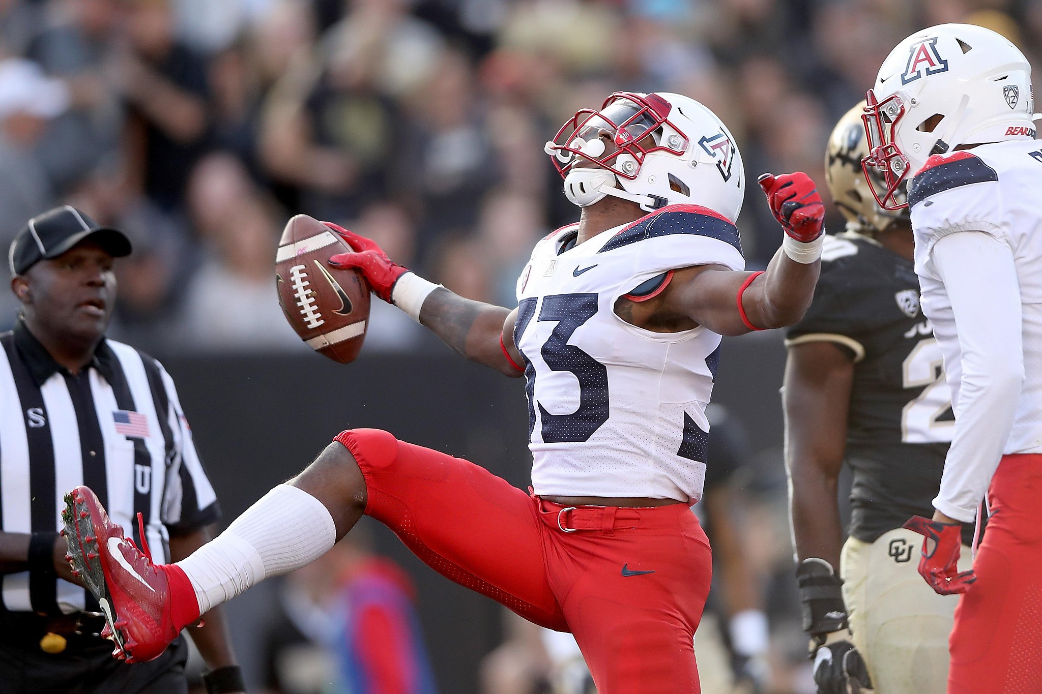 QB Khalil Tate leads Arizona past Colorado 35-30