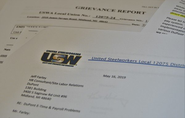 DuPont employees face ongoing pay issues