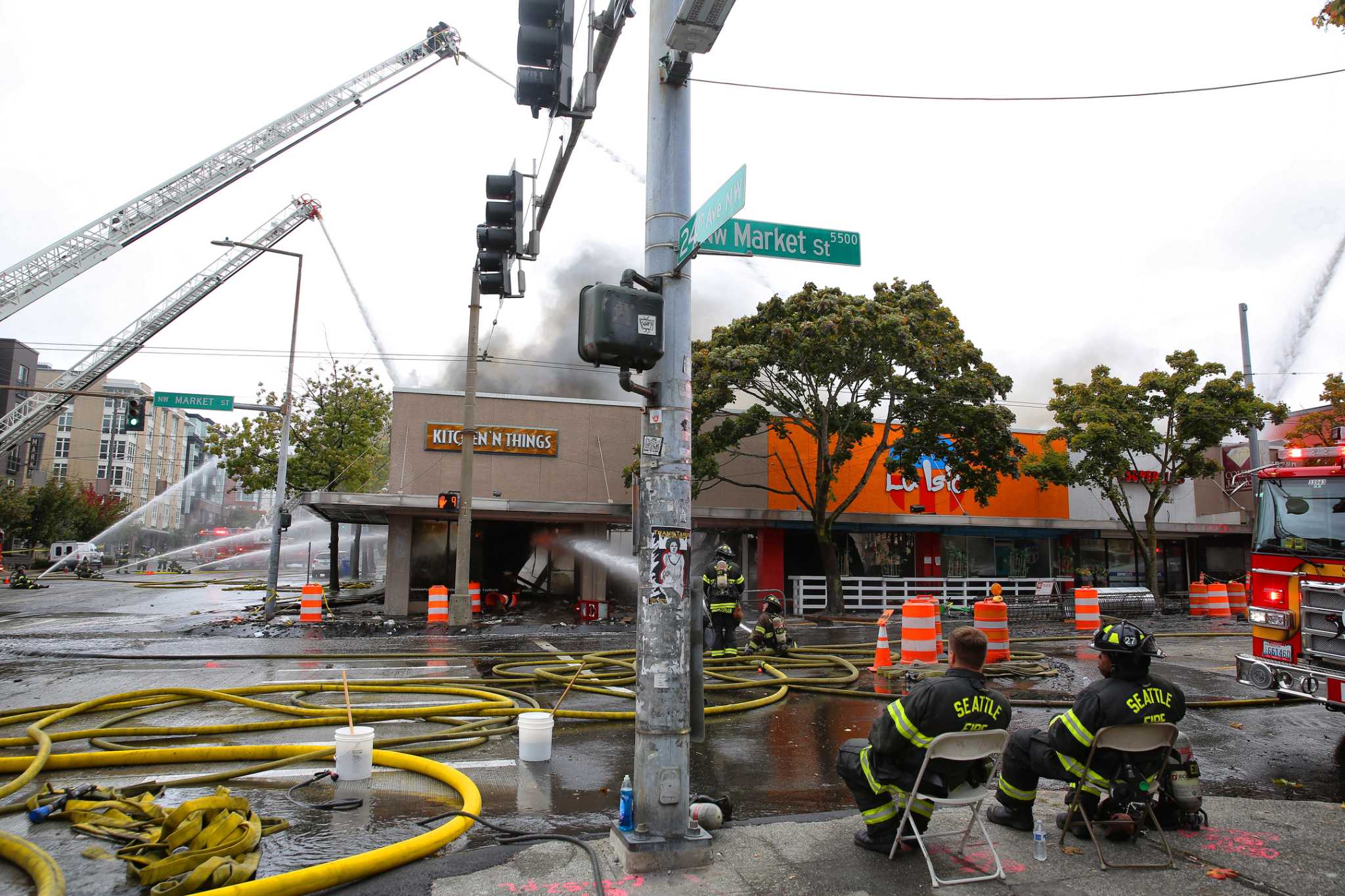 Fire in Ballard under control; firefighter injured, building destroyed
