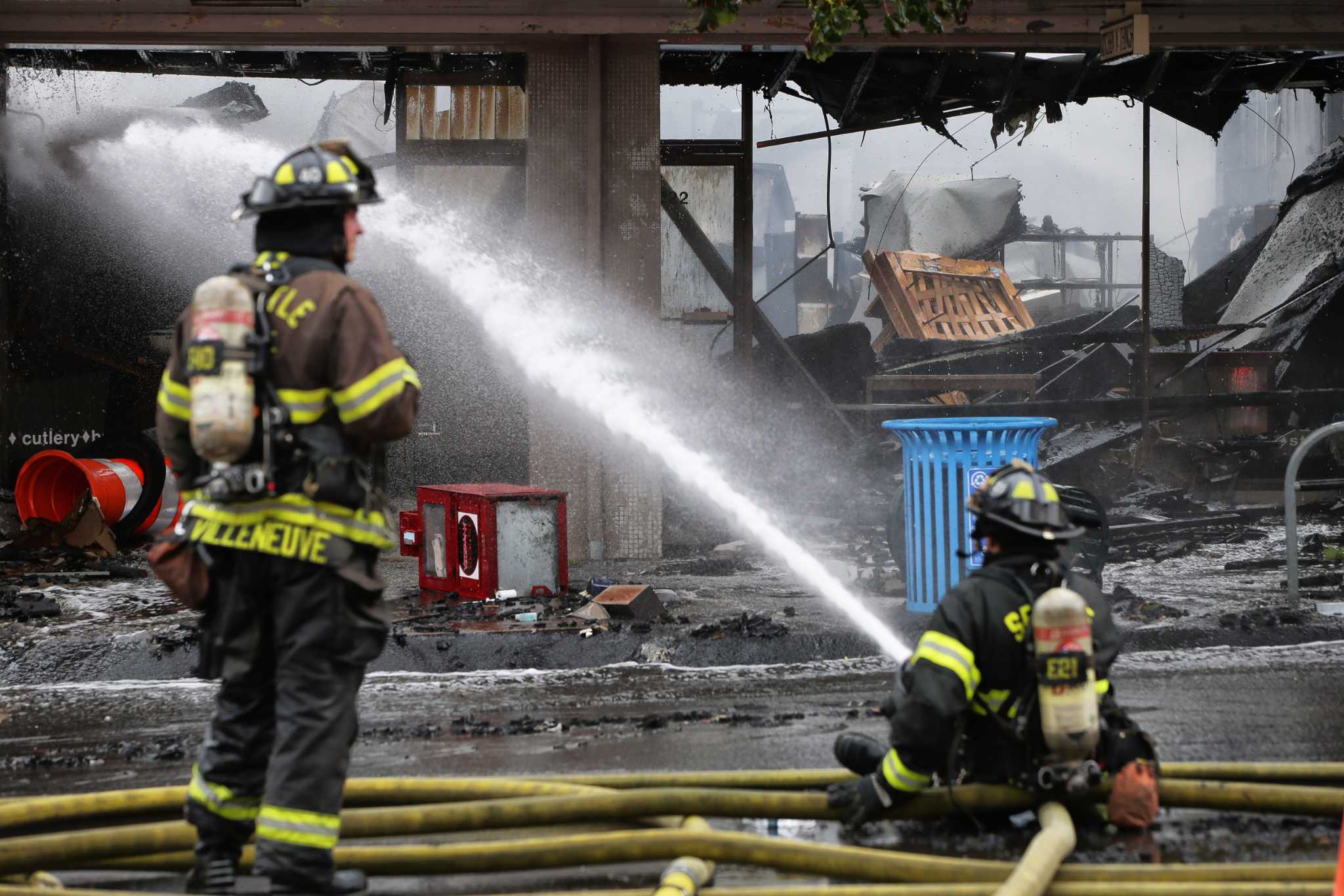 Fire in Ballard under control; firefighter injured, building destroyed