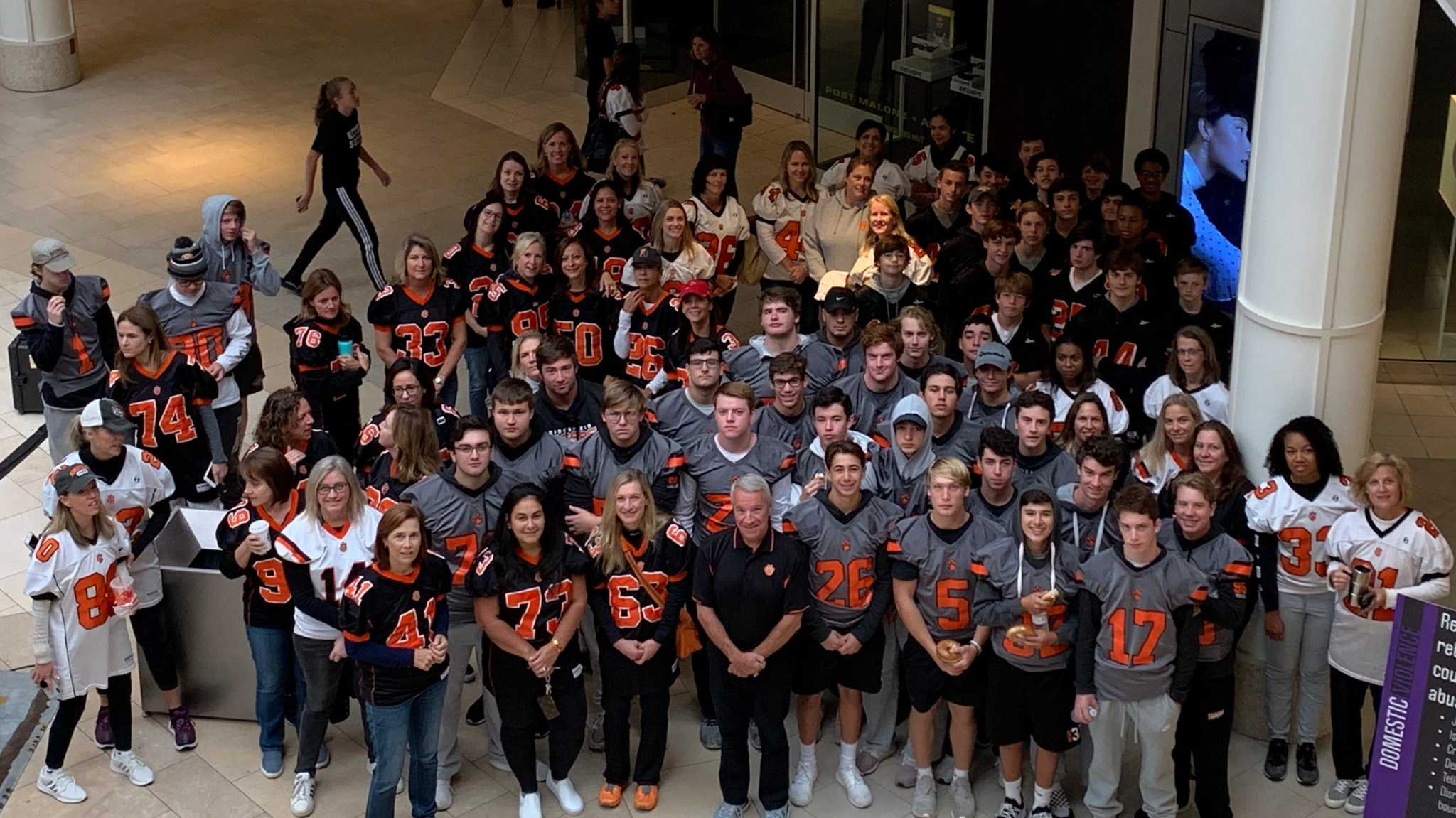 Ridgefield football team marches in annual Safe Walk