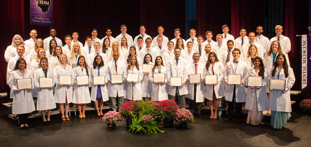 SIU SDM students receive white coats