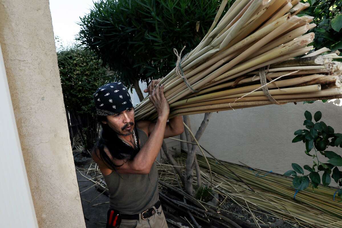 Reeds, hands and old ways come together to make Ohlone boat to paddle ...