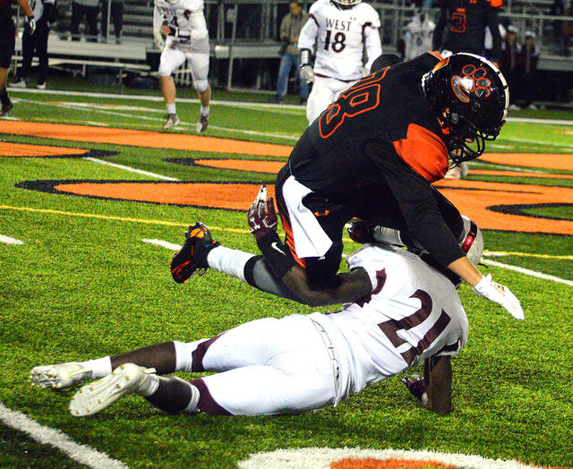 FOOTBALL: Tigers cruise to Homecoming win