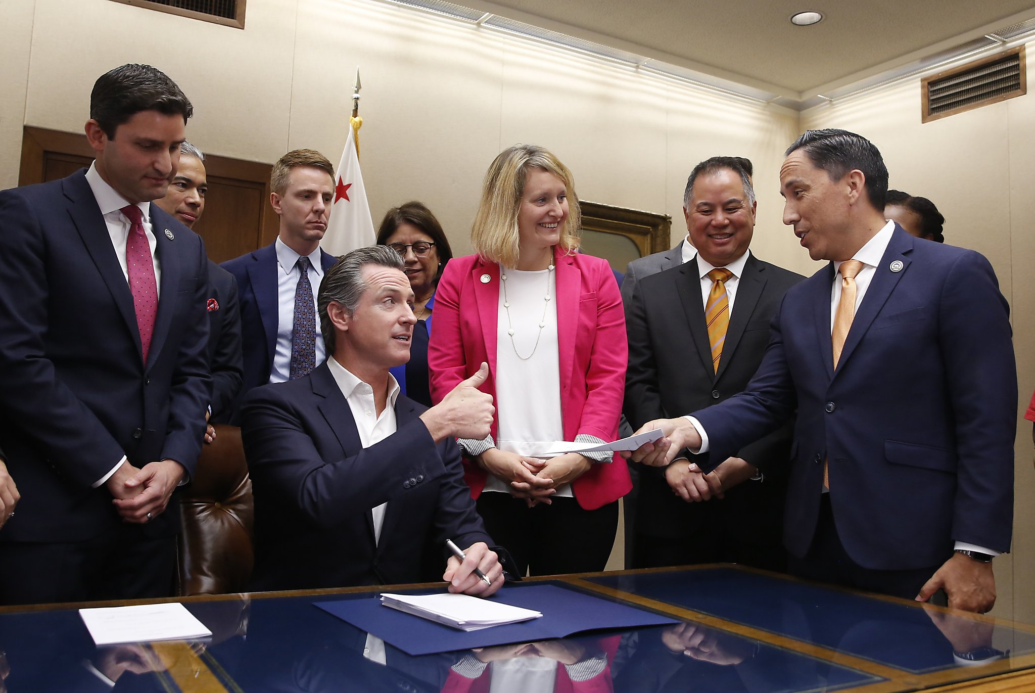 In acting on 1,000 new bills, Newsom shows he’s not Jerry Brown
