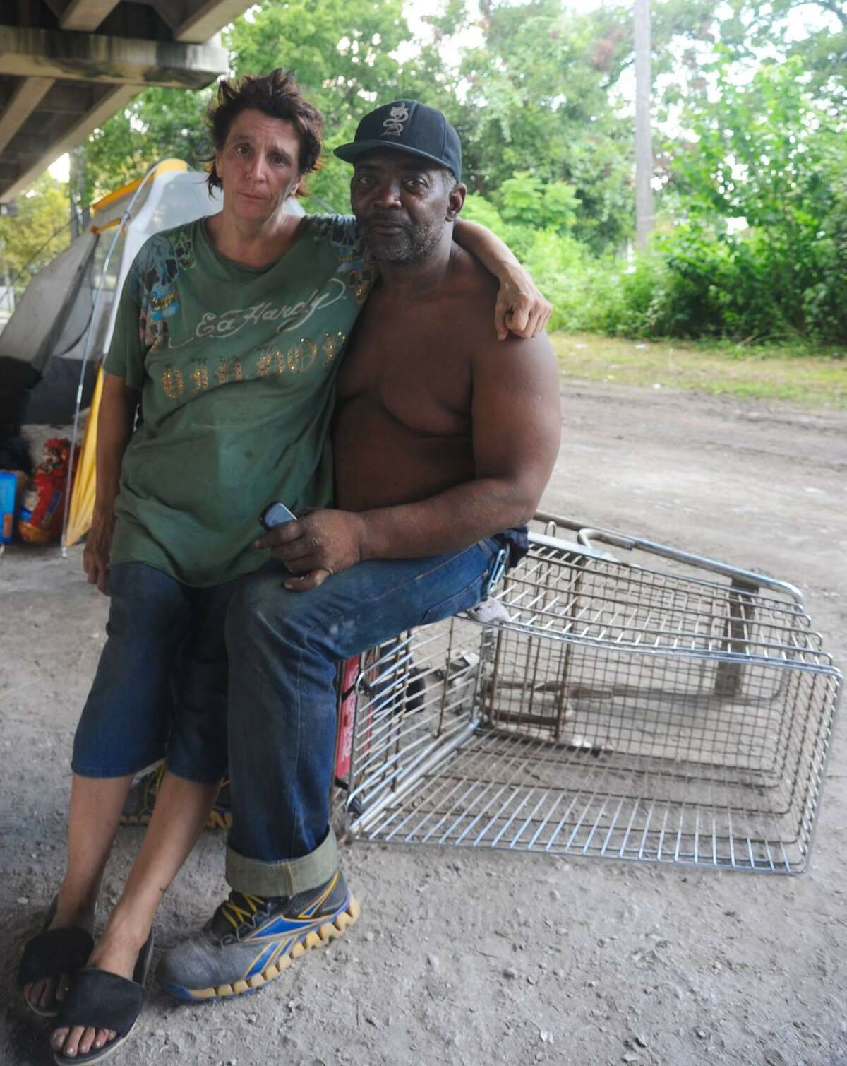 She rescued dogs. He led a lawsuit against the city. They died together ...