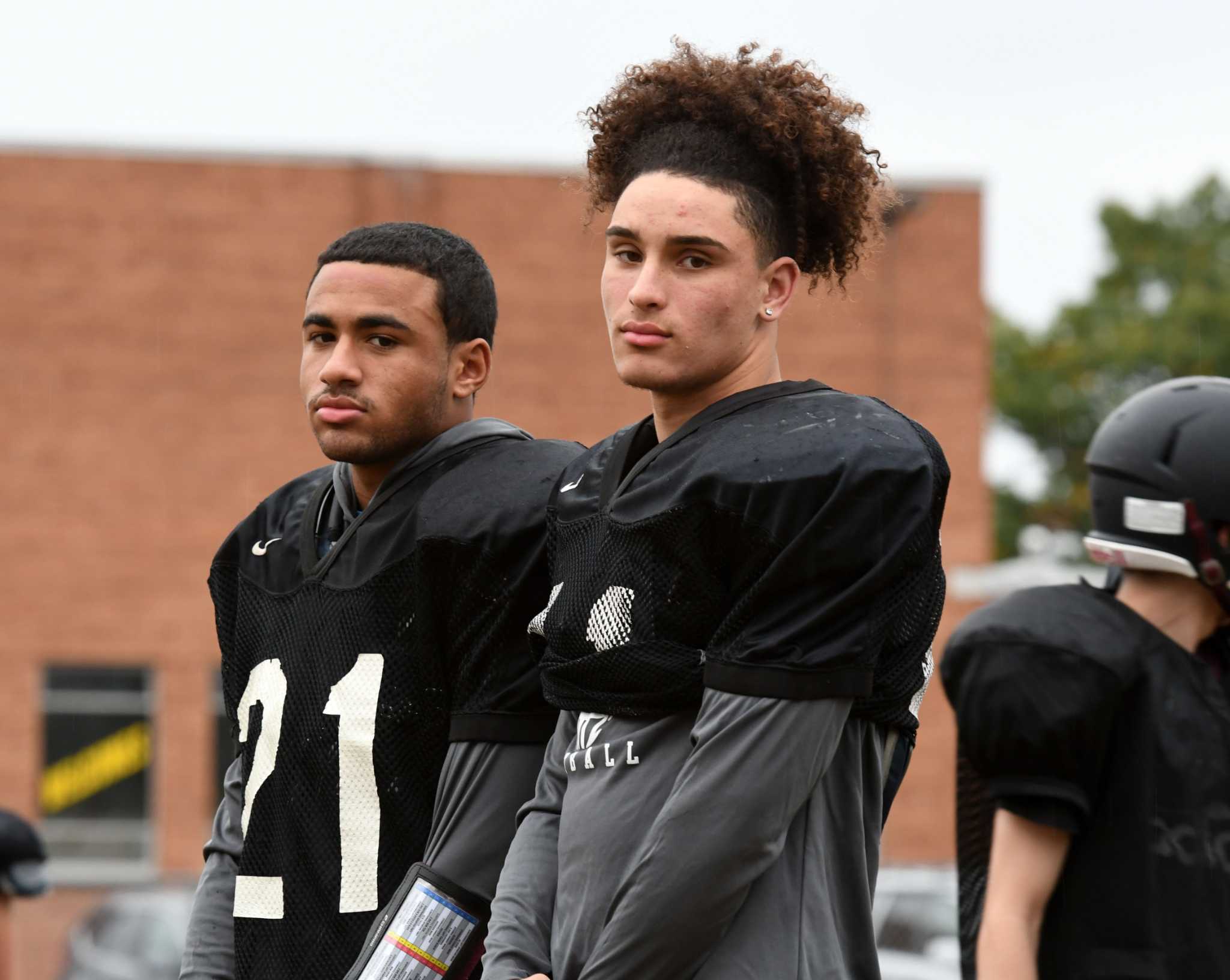 Holy Trinity football's towering tandem