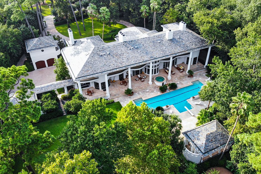Secluded $13.7M Memorial mansion offers the ultimate backyard hotel ...