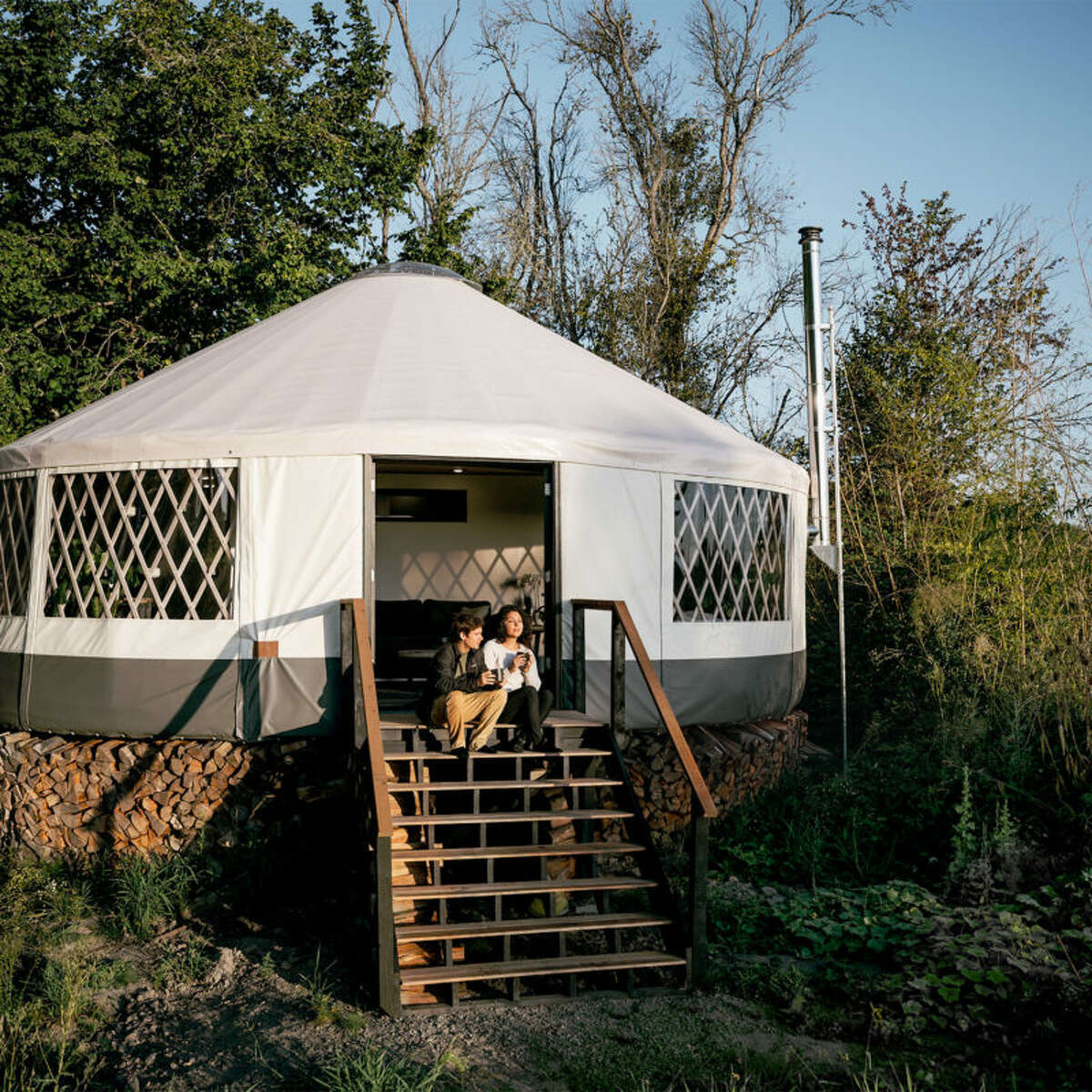 You’ll want to move into this modern, foliage-filled yurt