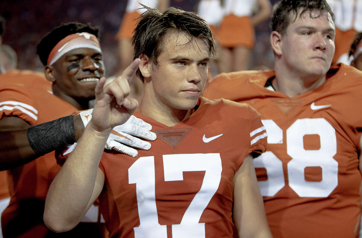 Texas hangs on for win over Kansas in high-scoring shootout