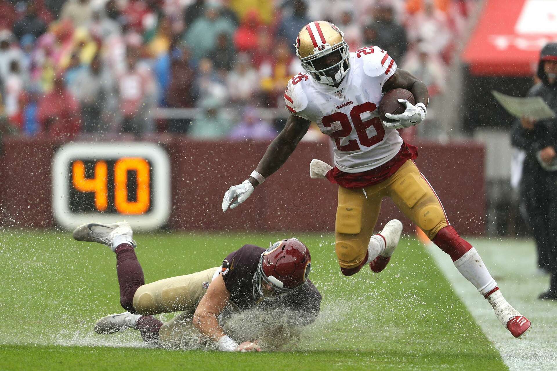 Drenching rain turns 49ers game into giant slip-n-slide