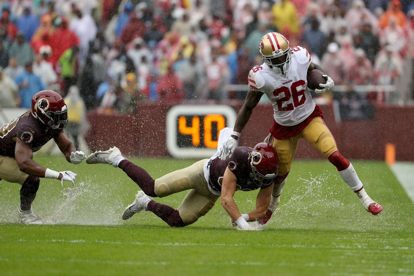 Drenching rain turns 49ers game into giant slip-n-slide