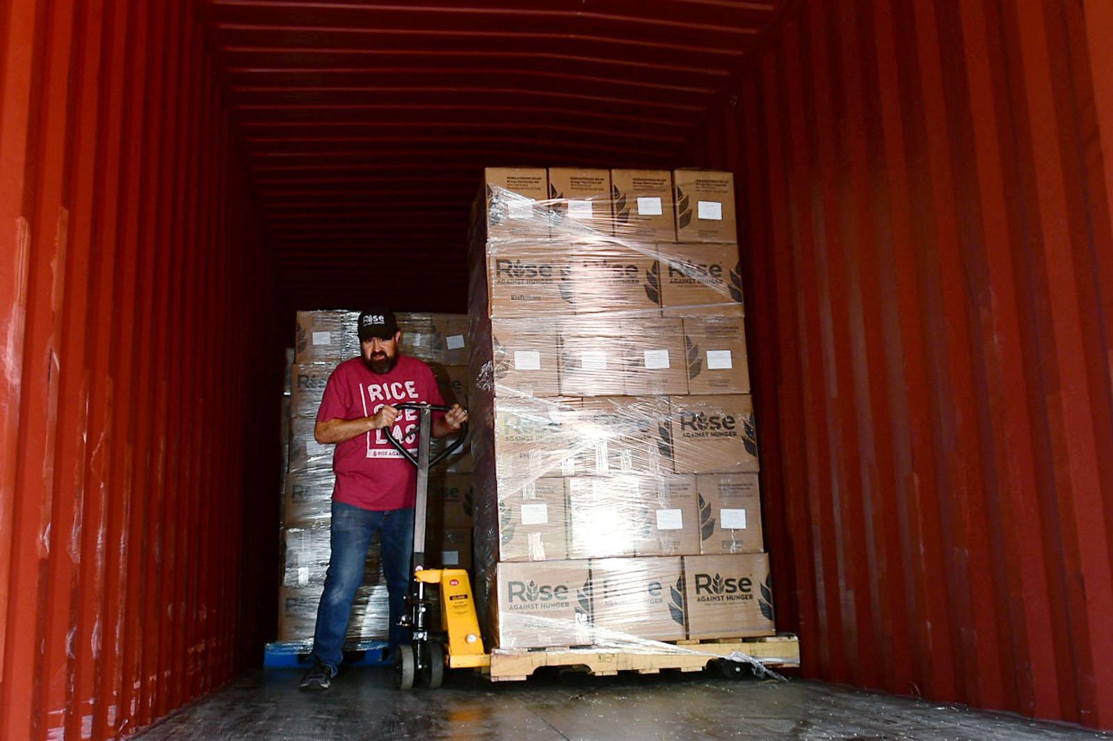 Opinion: Why you should volunteer at Wi-Act's meal-packaging event