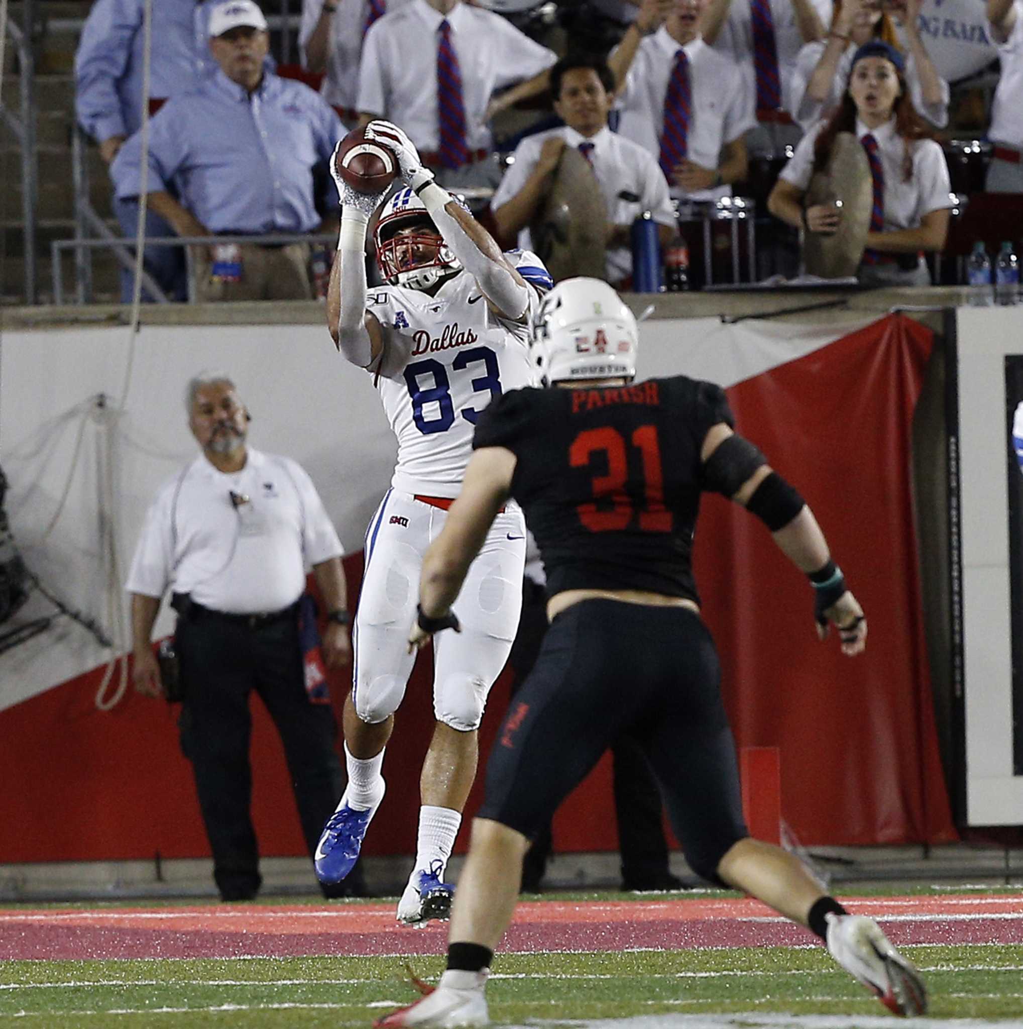 Mustangs hold off Cougars, stay perfect