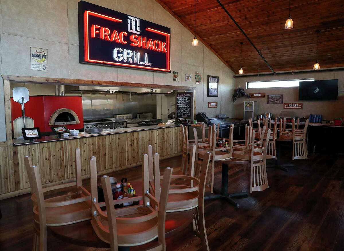 The evolution of 'man camps' — from tents to basketball courts and ...