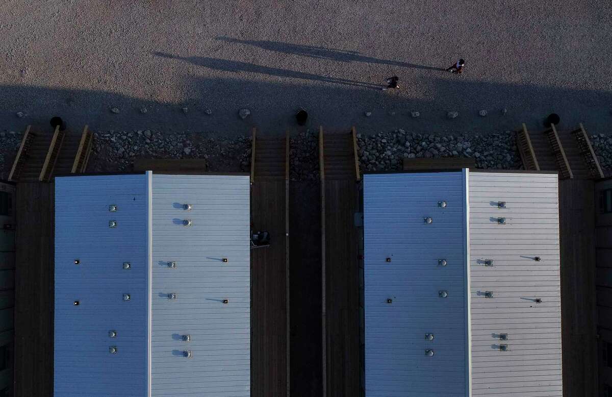 The evolution of 'man camps' — from tents to basketball courts and ...