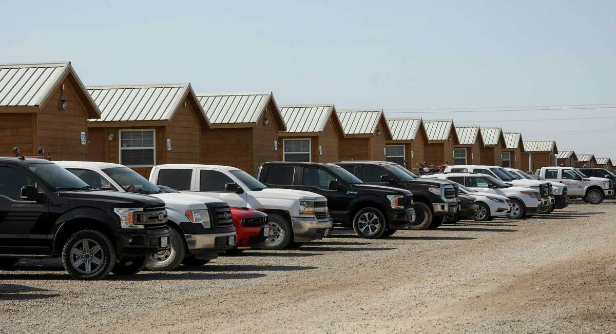 The evolution of 'man camps' — from tents to basketball courts and ...