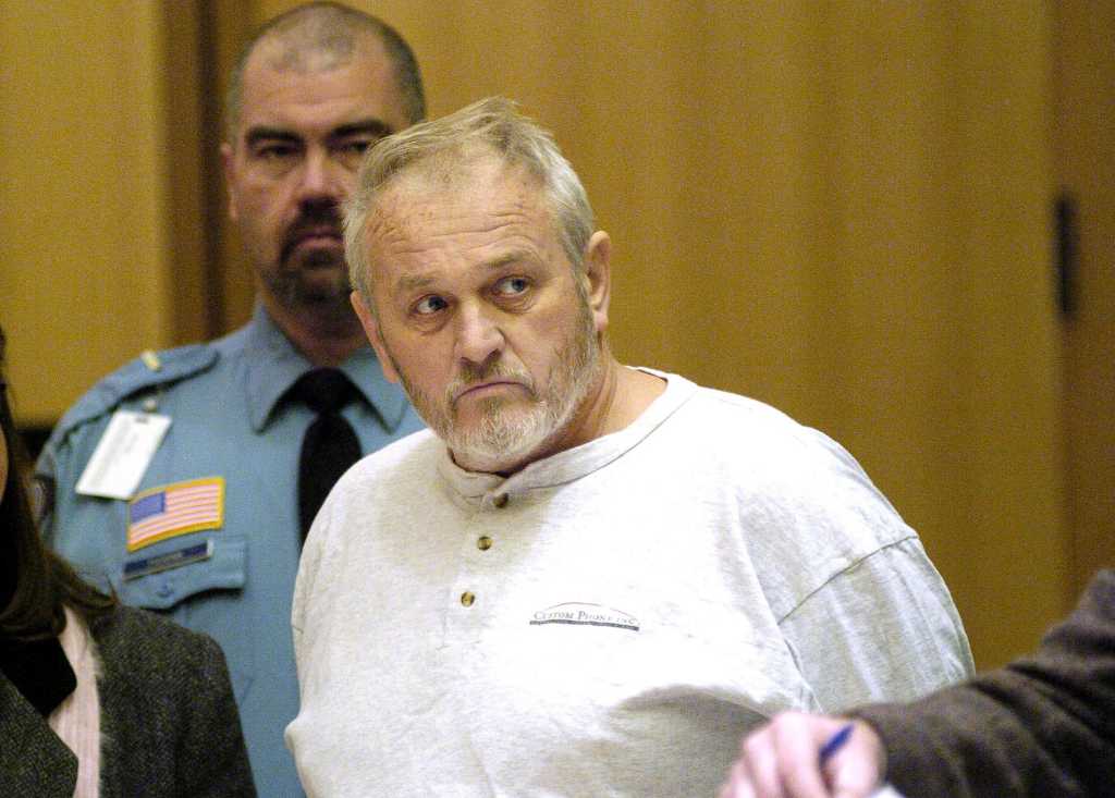 Warrant details manic behavior of December murder suspect