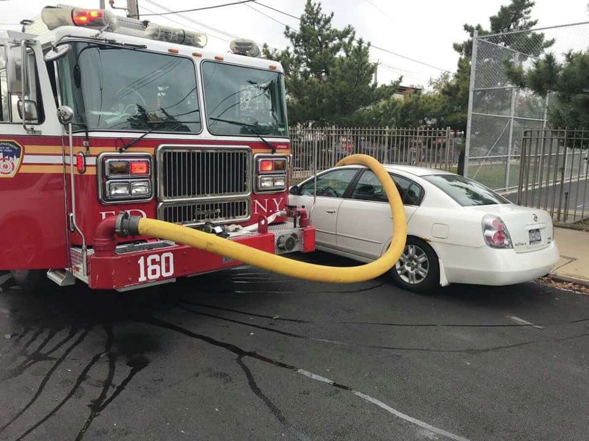 What firefighters did when a vehicle blocked a fire hydrant