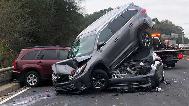 Wild 4-vehicle crash ends with SUV on top of car in Mississippi