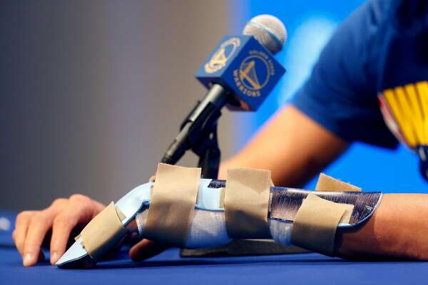 Stephen Curry says he expects to return from hand injury in early ...