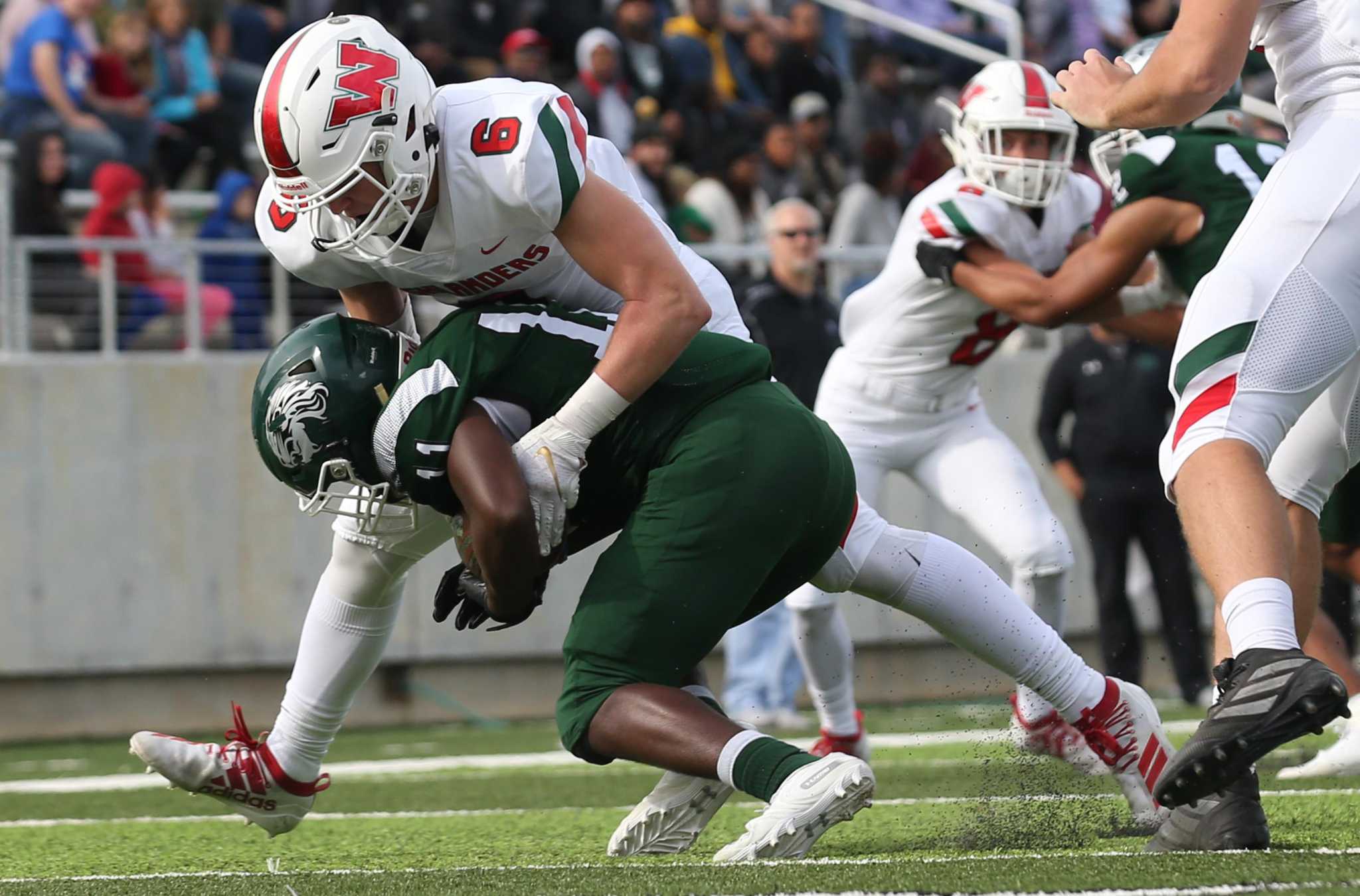 FOOTBALL: The Woodlands tops Spring with dominant defense