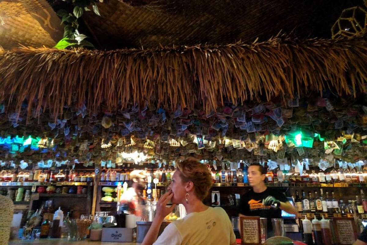 For years, people pinned dollar bills to the ceiling of Alameda bar ...