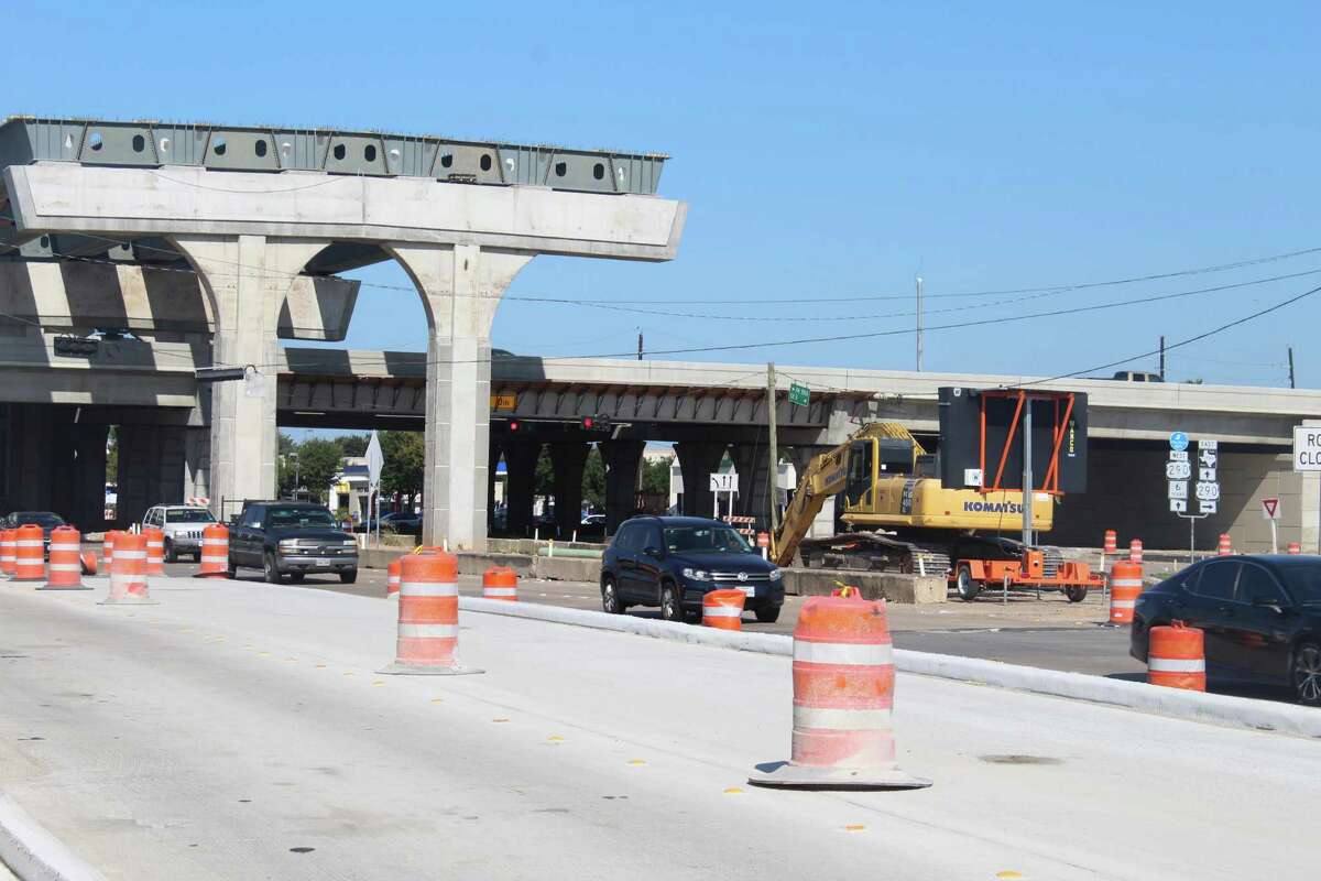 Businesses near construction of FM 1960/Hwy. 6 bridge over U.S. 290 ...