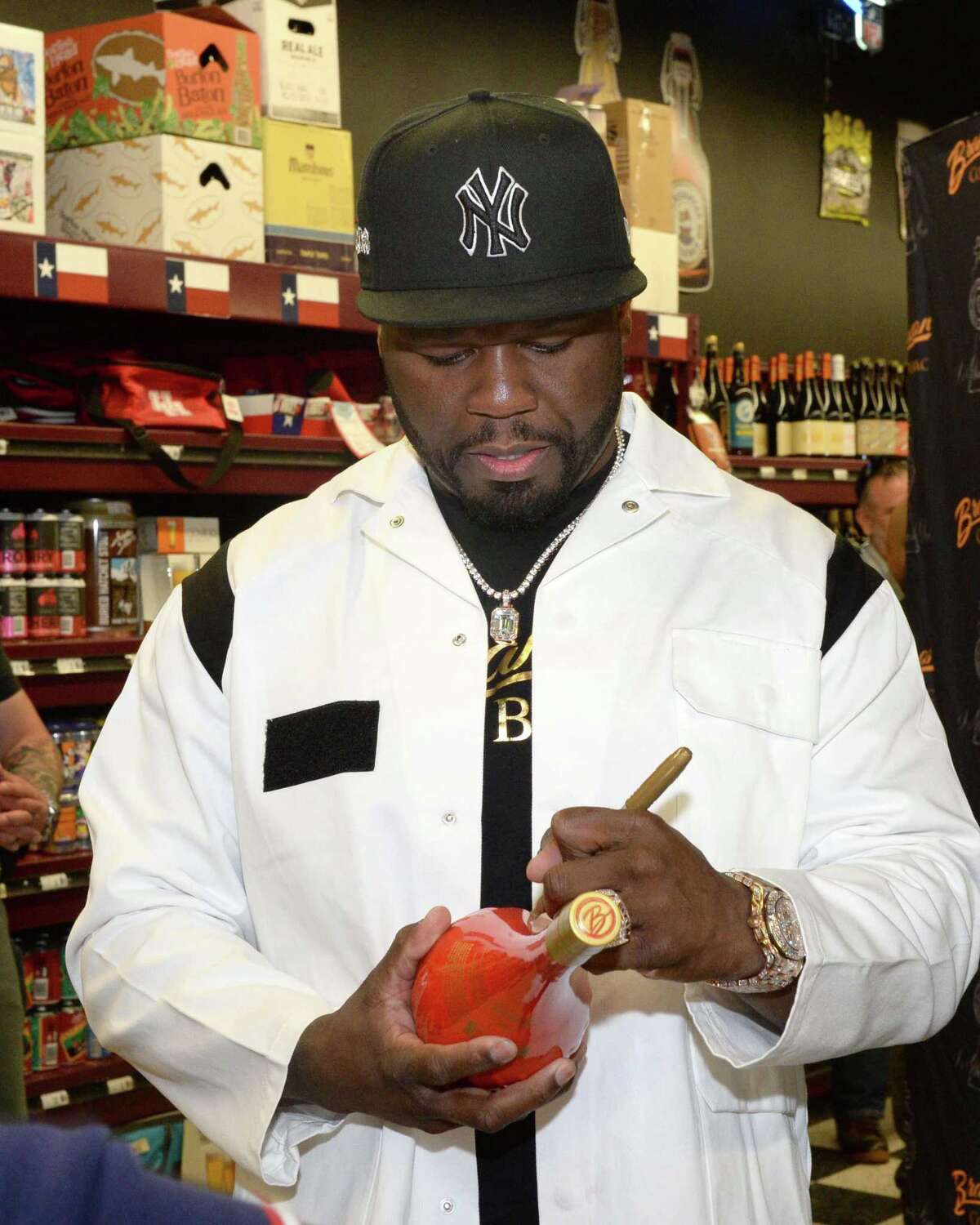 50 Cent stops in Houston area to promote lines of champagne, cognac ...