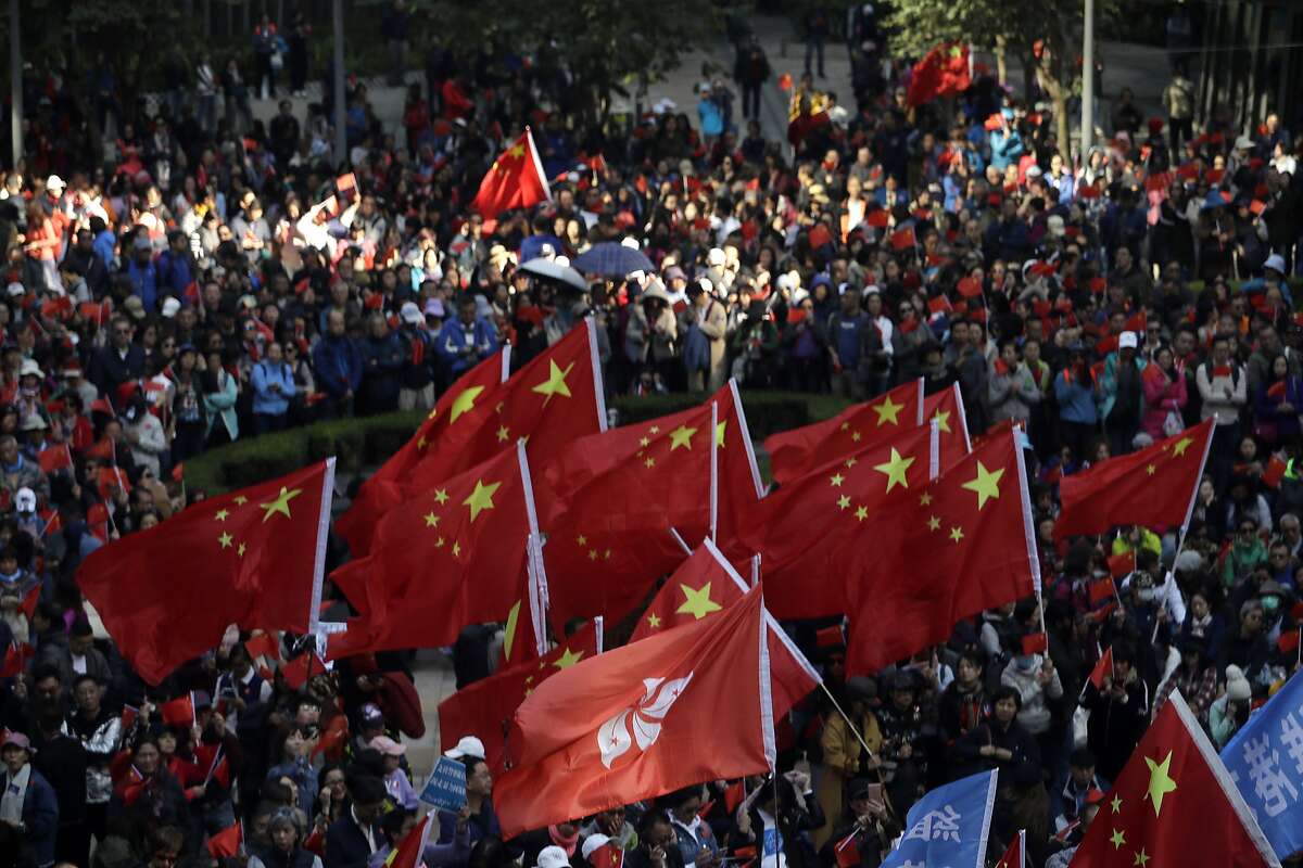 China supporters rally in Hong Kong to denounce violent 'rioters'