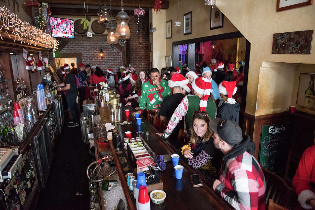 Bartenders reveal what it's like serving all the Santas during SantaCon