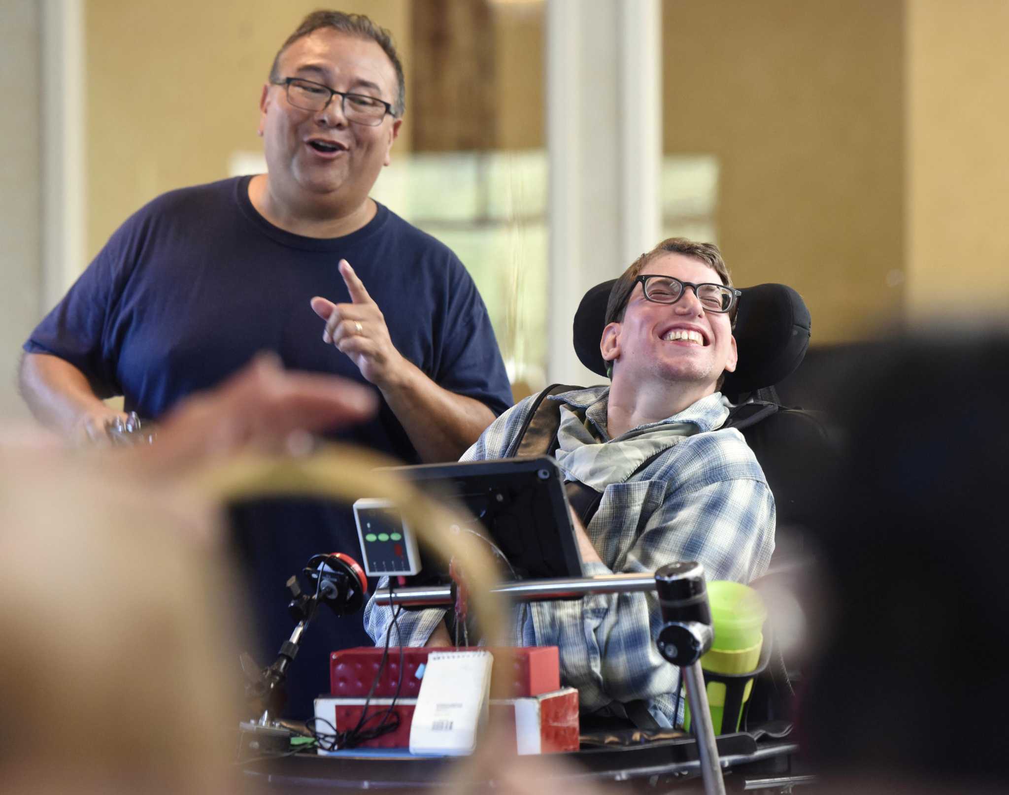 Watch special needs man bring joy, music to Greenwich