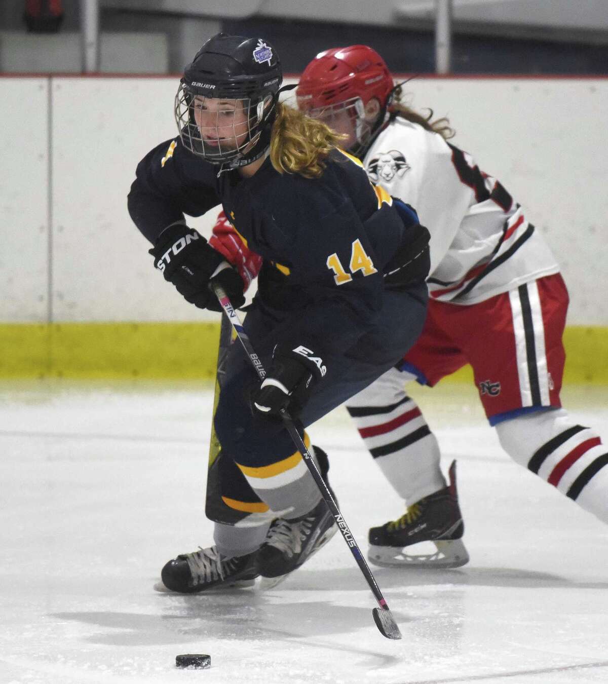 Simsbury edges defending state champ New Canaan in girls ice hockey opener