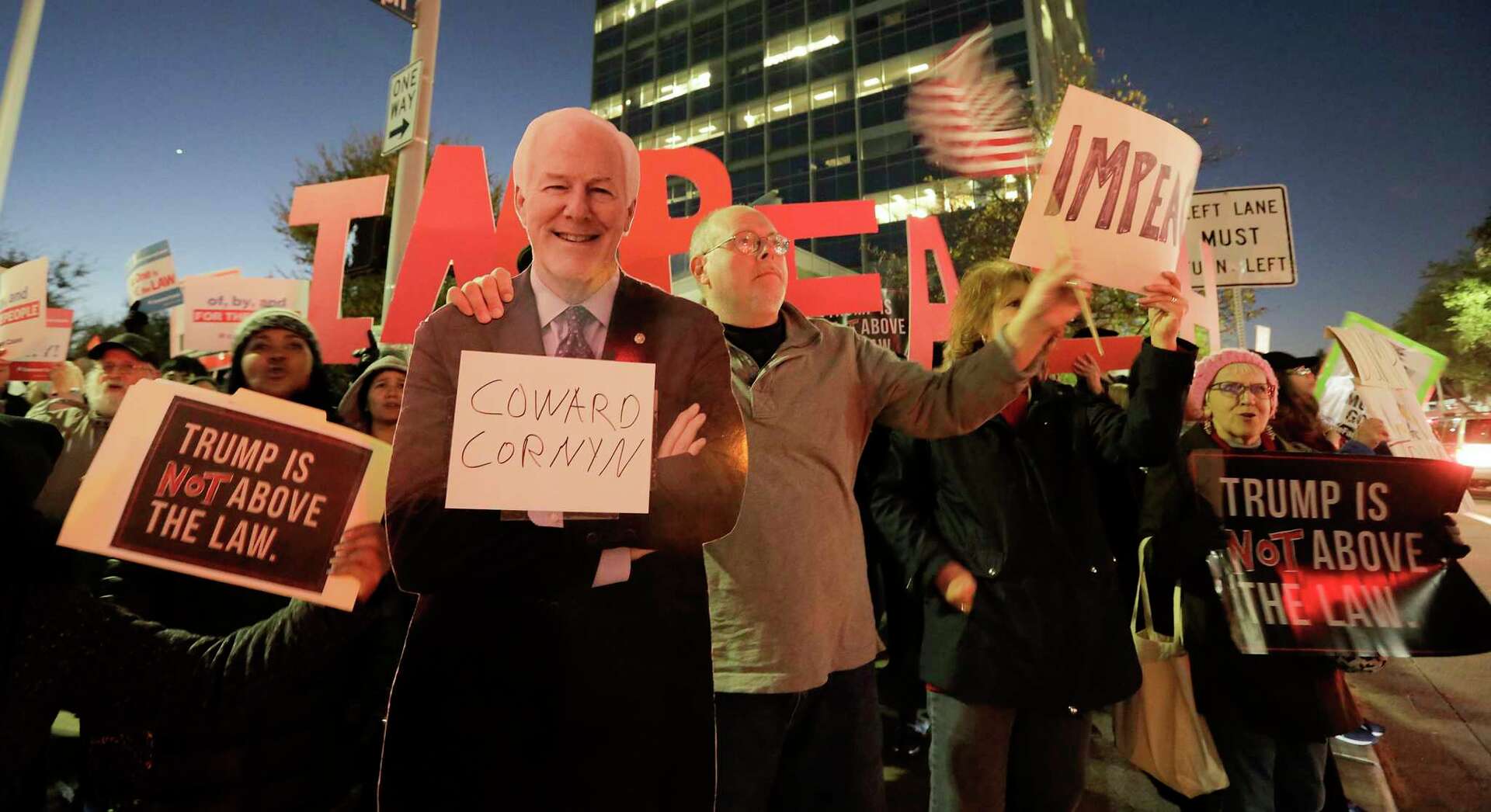 Modest but passionate turnout at pro-impeachment rallies
