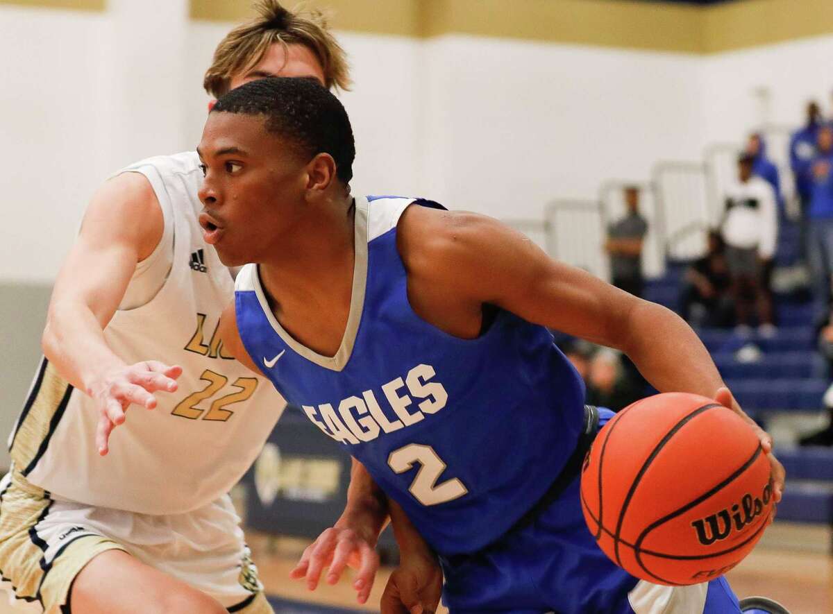BOYS HOOPS: Lake Creek pulls away from New Caney late