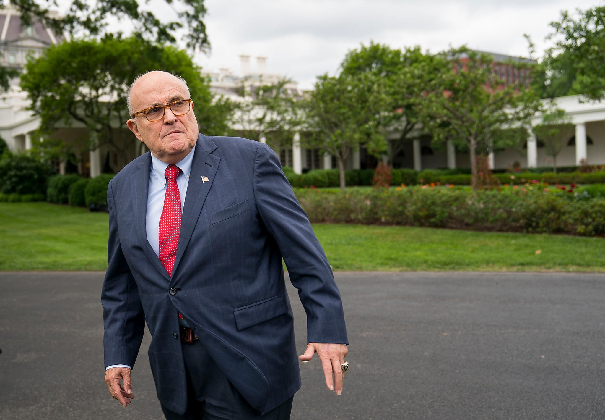 Rudy Giuliani mixed White House role, personal business in cybersecurity