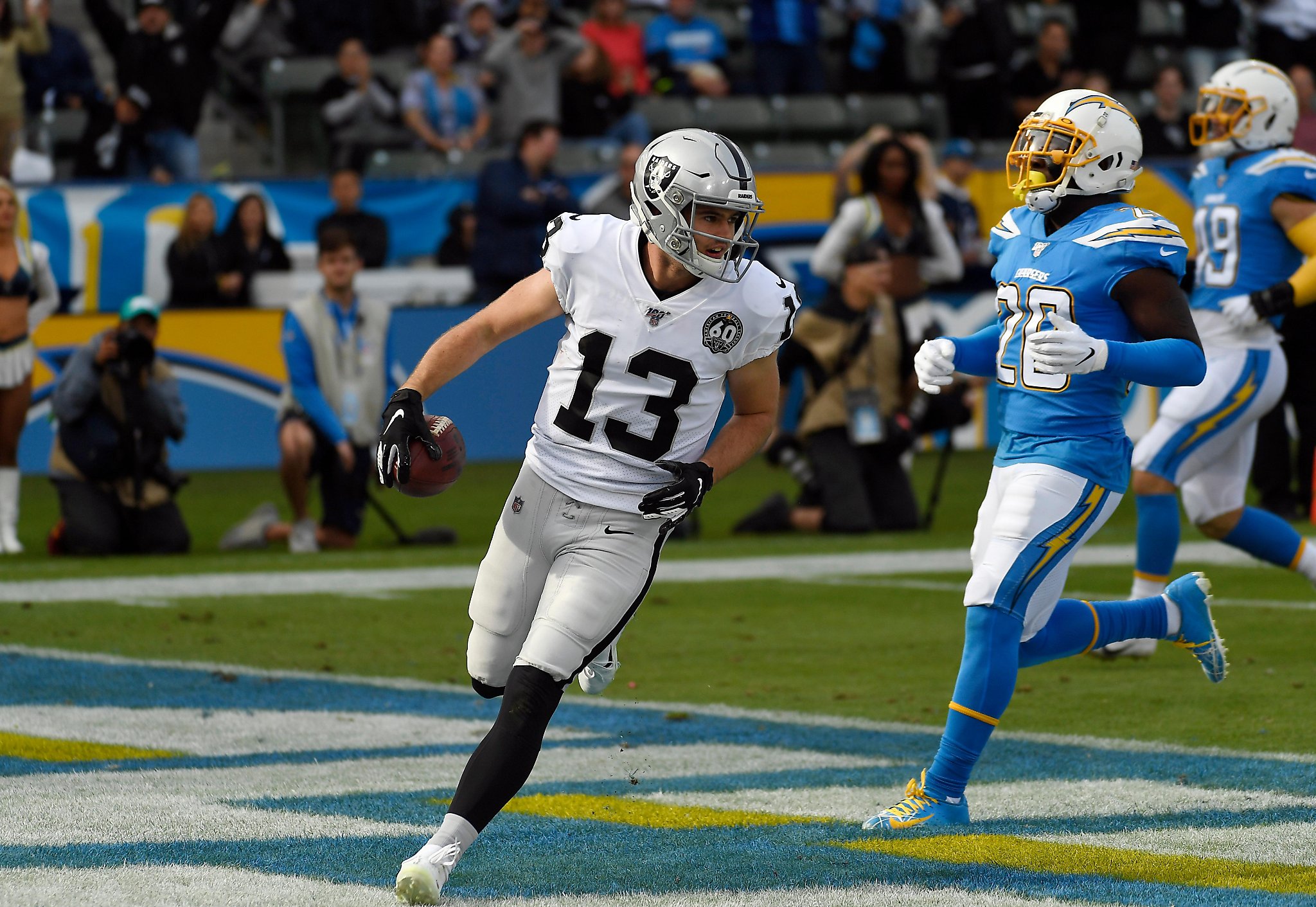 Raiders keep playoff hopes alive with victory over Chargers
