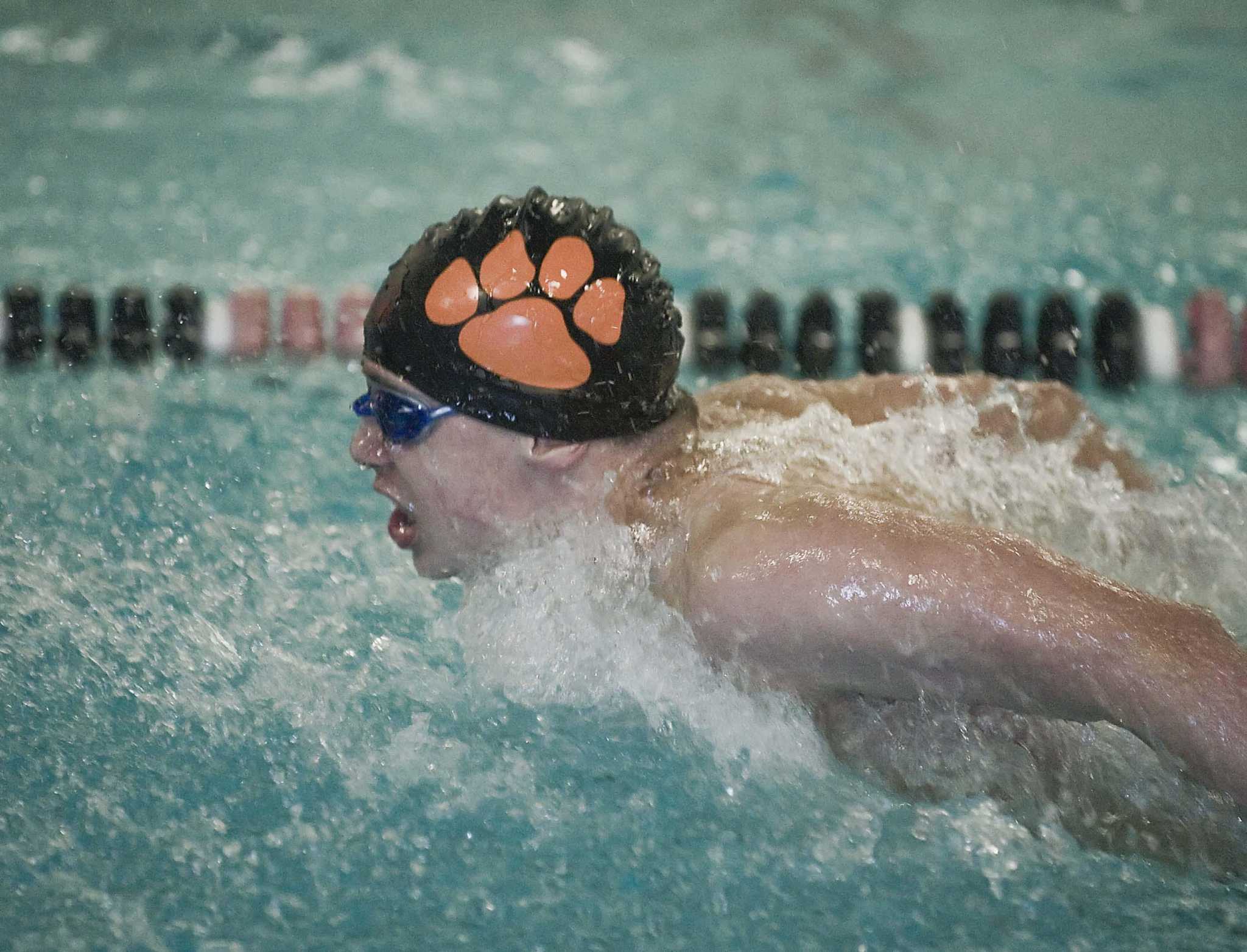 Ridgefield swimmers start season with dominating win
