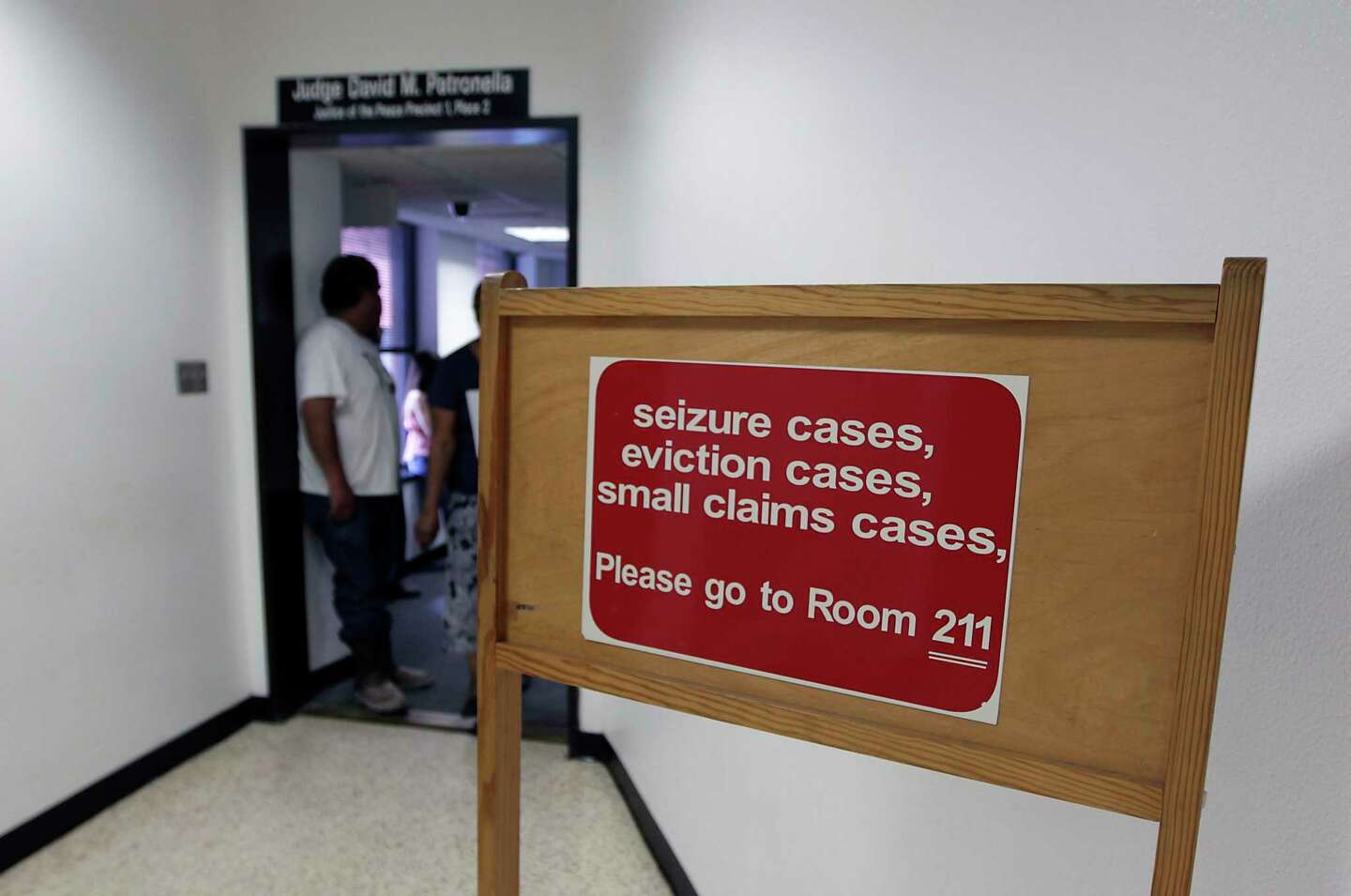 How do I file a small claims case in Harris County?