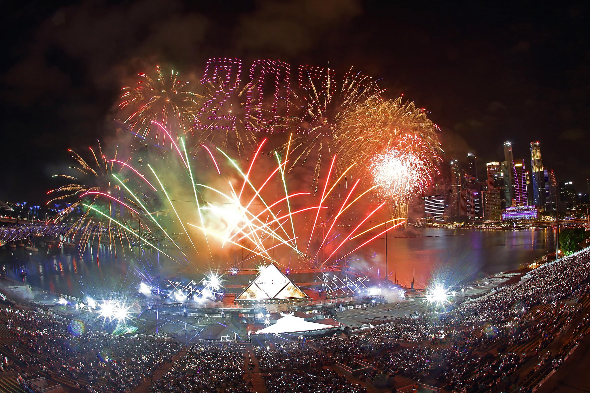 Revelers around the world usher in the new decade
