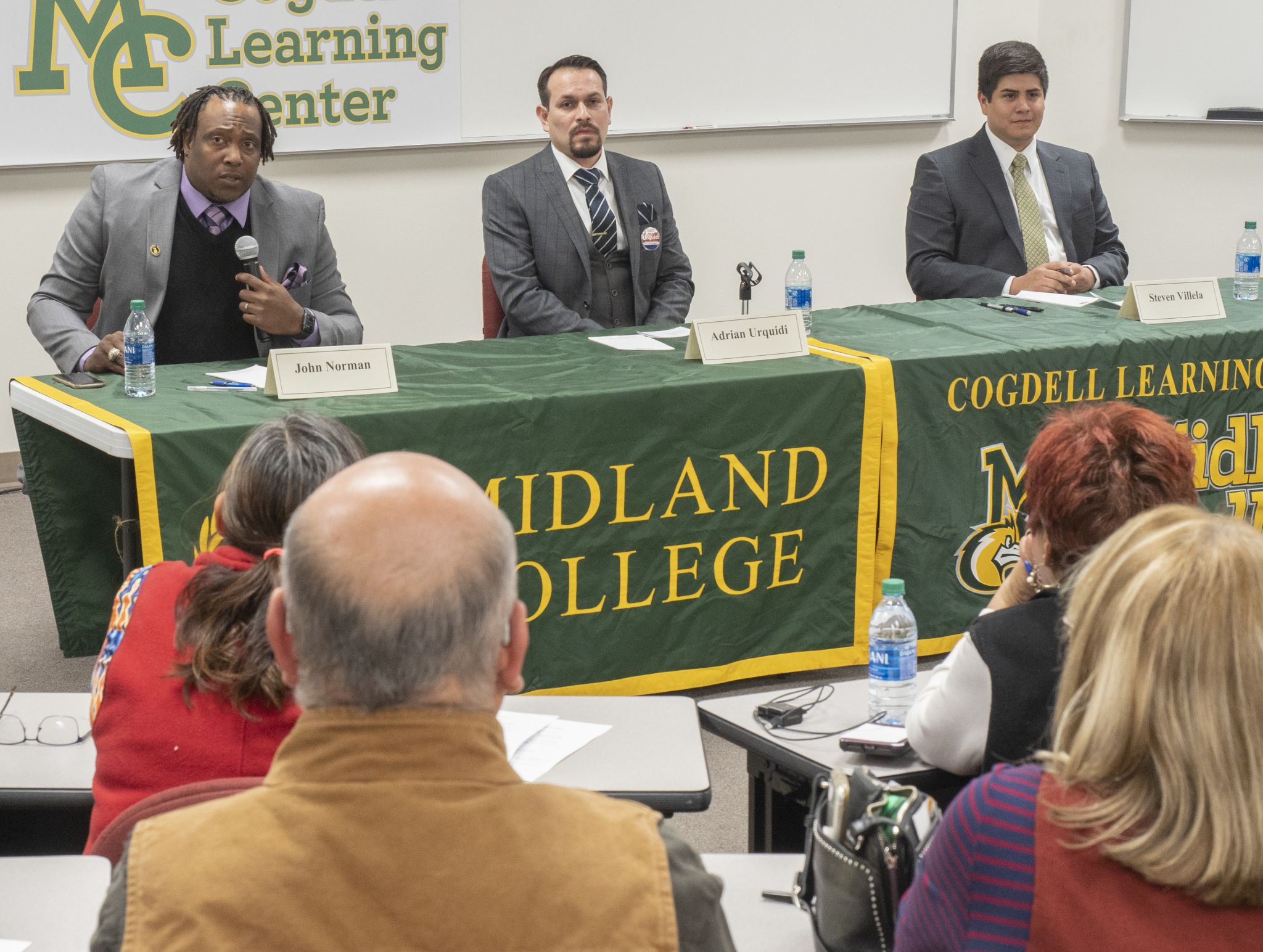 Candidates talk about policing, communication at District 2 forum