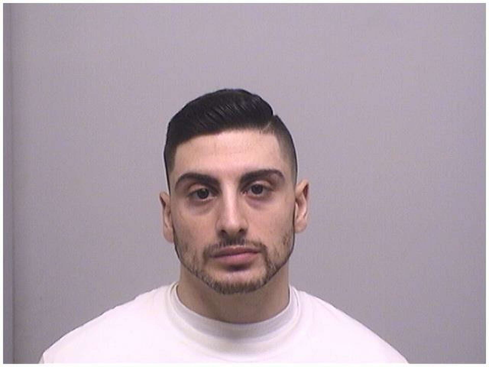 Stamford father and son charged with witness tampering