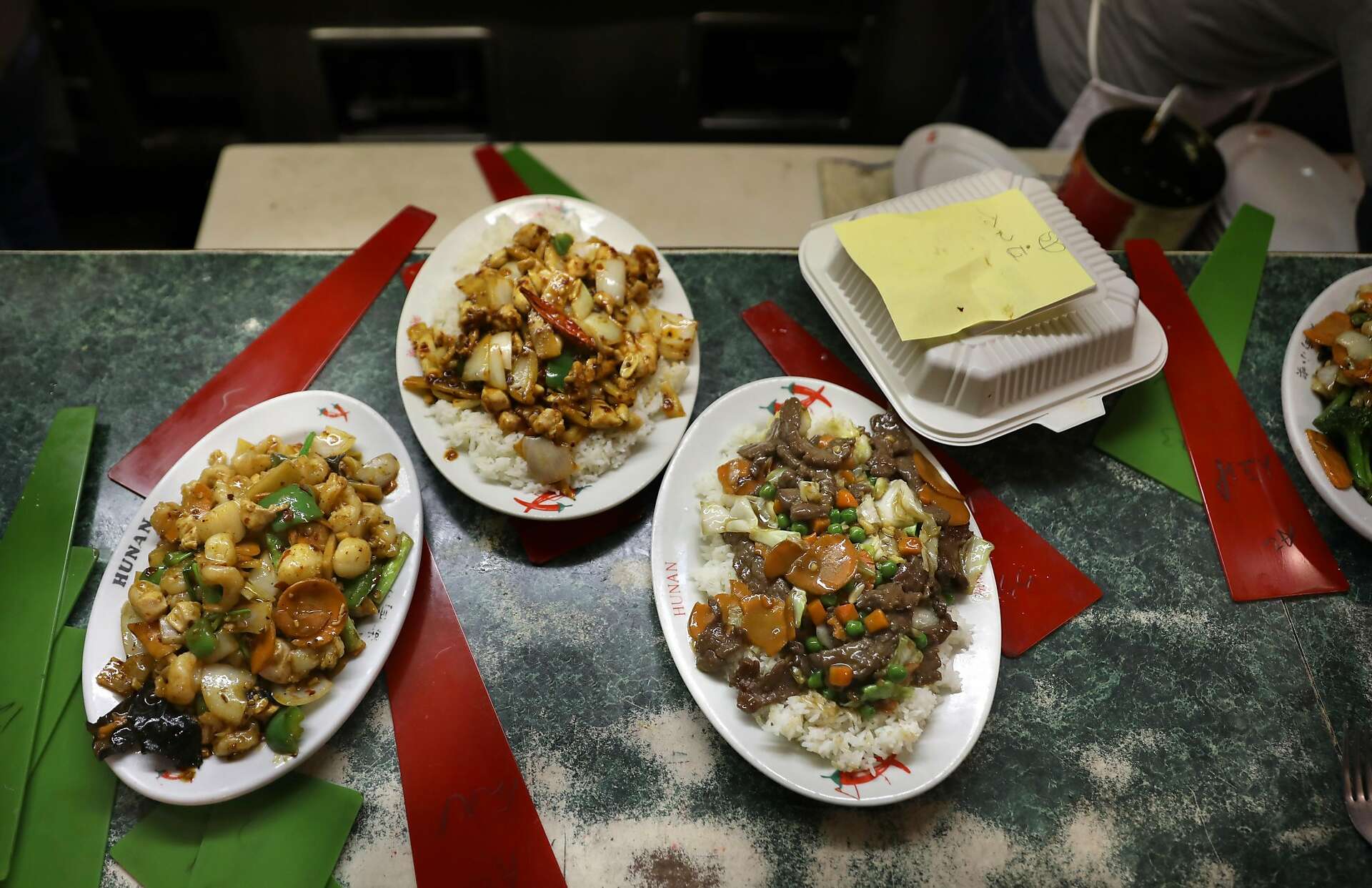 Three generations at work in Henry’s Hunan restaurants in San Francisco