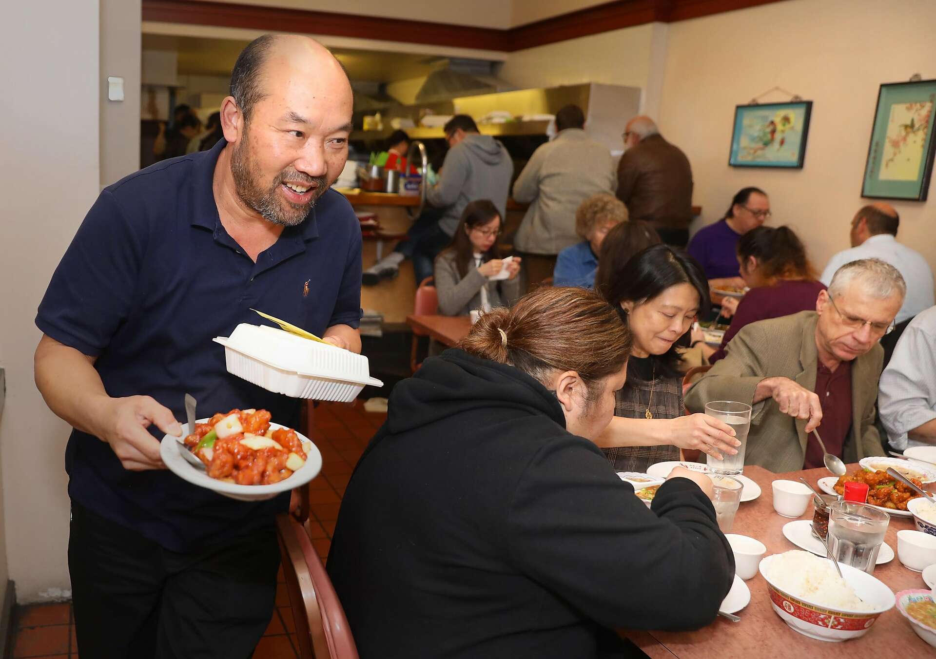 Three generations at work in Henry’s Hunan restaurants in San Francisco