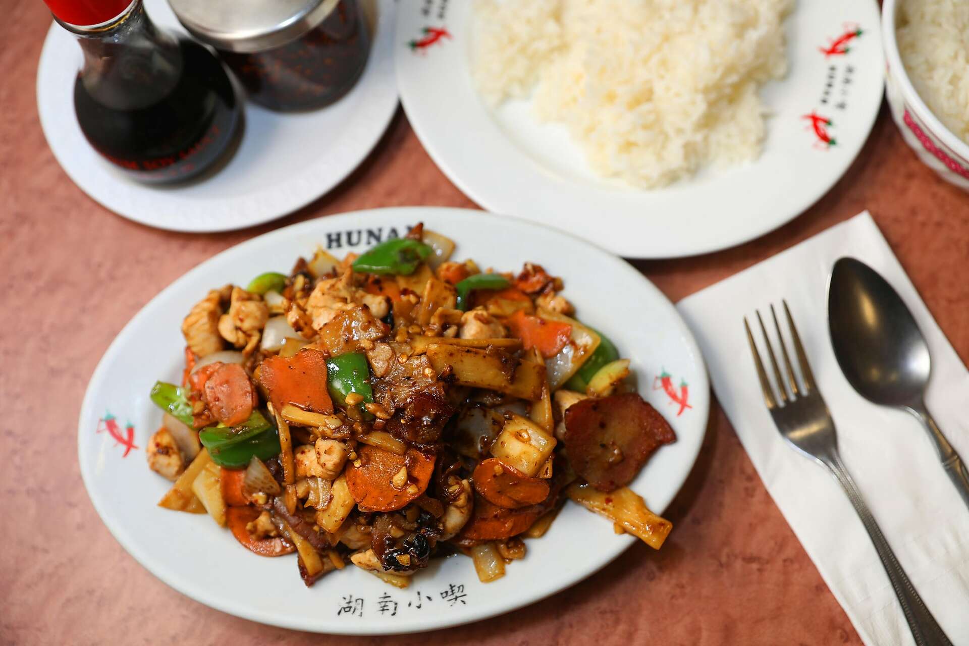 Three generations at work in Henry’s Hunan restaurants in San Francisco