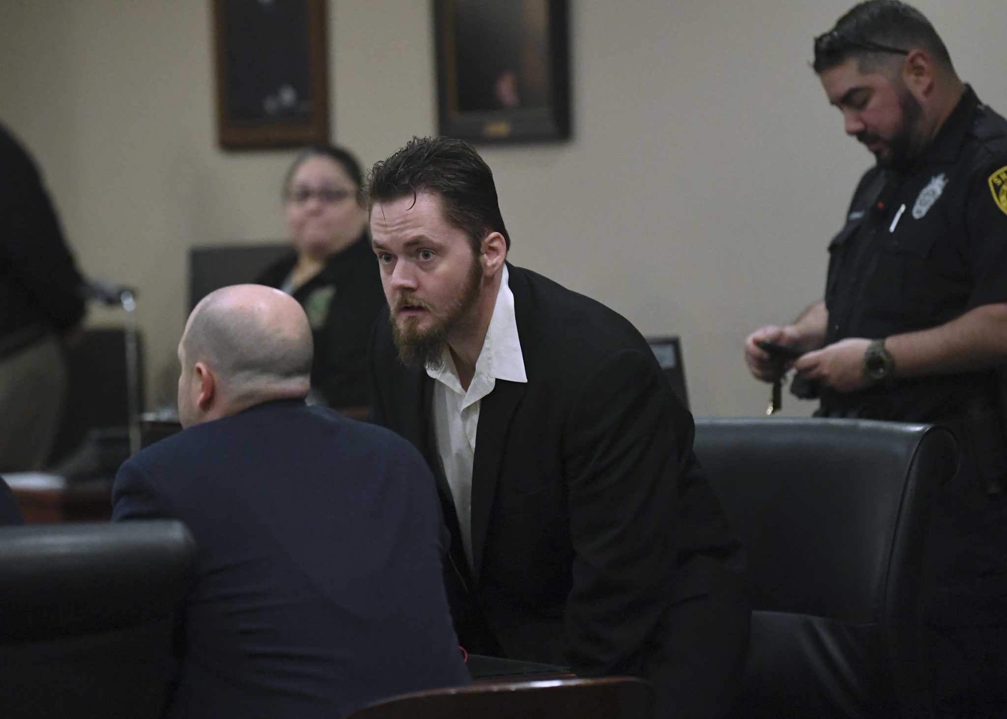 Defendant who tried to take gun from bailiff in holding cell is ...