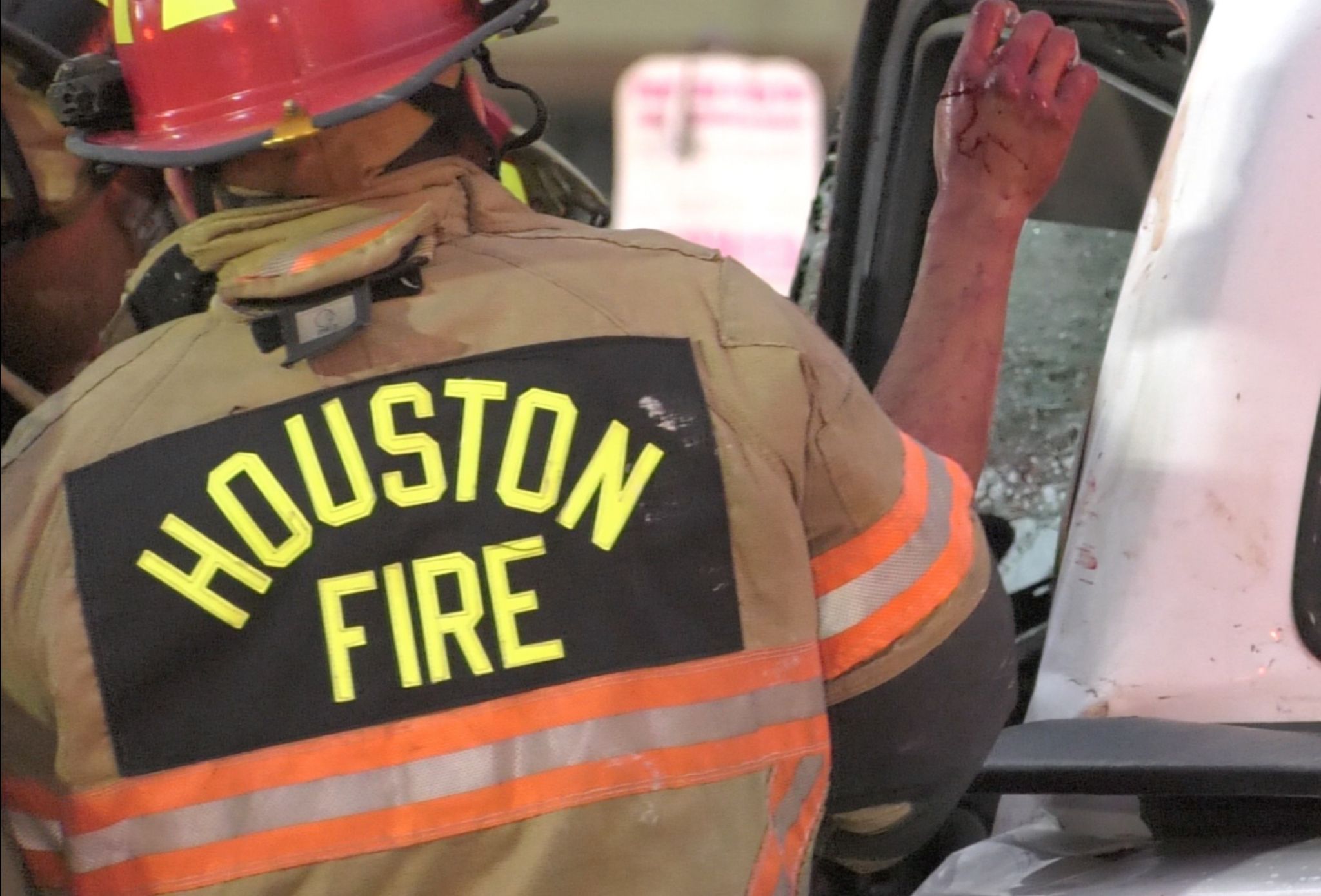 Pair survive violent crash that trapped driver in southwest Houston