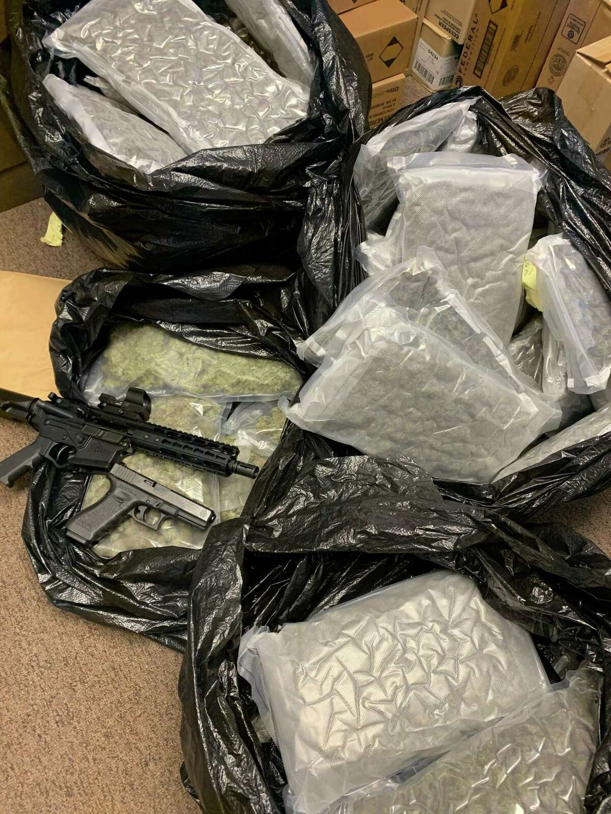 PAPD raid yields 50 pounds of marijuana, two guns